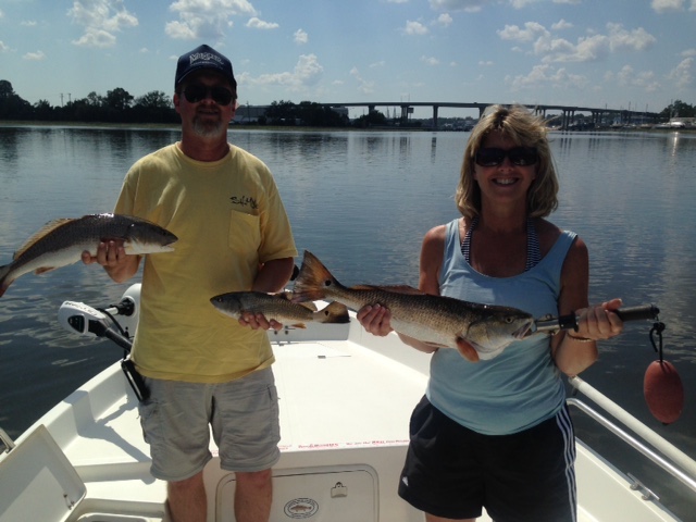 Chuck & Lisa O'Kelly catching redfish & black drum. Strong bite on a ...