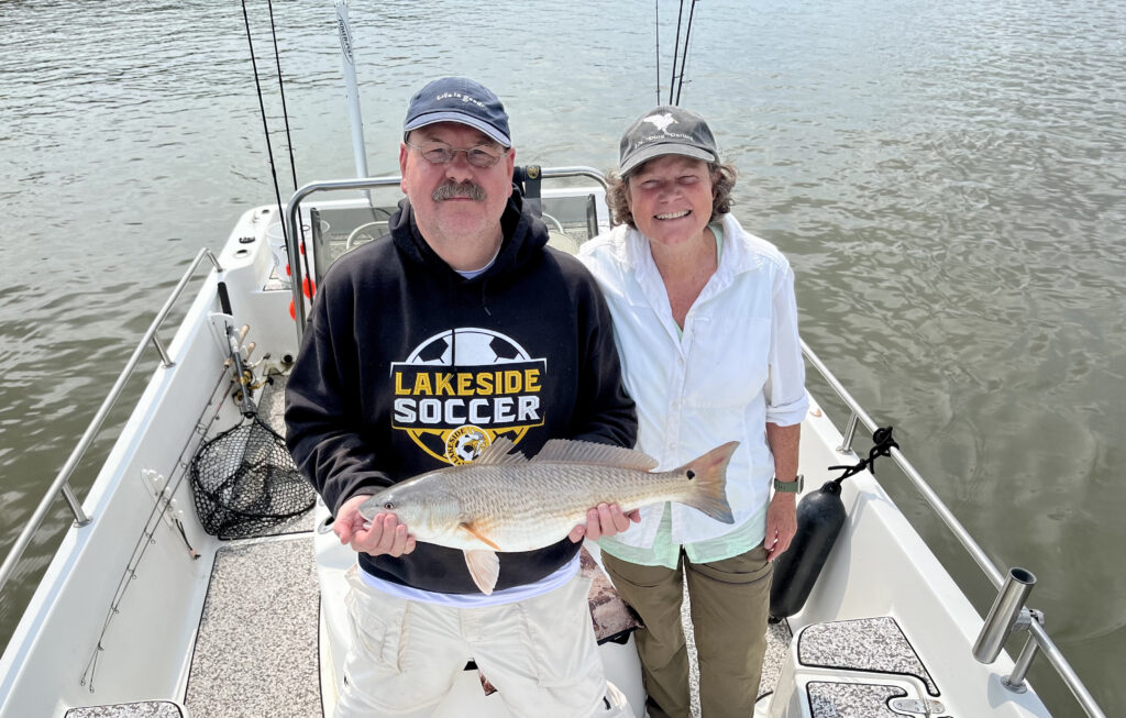 Terry & Jenny Parker with a nice red! Beautiful day! - Coastal River ...