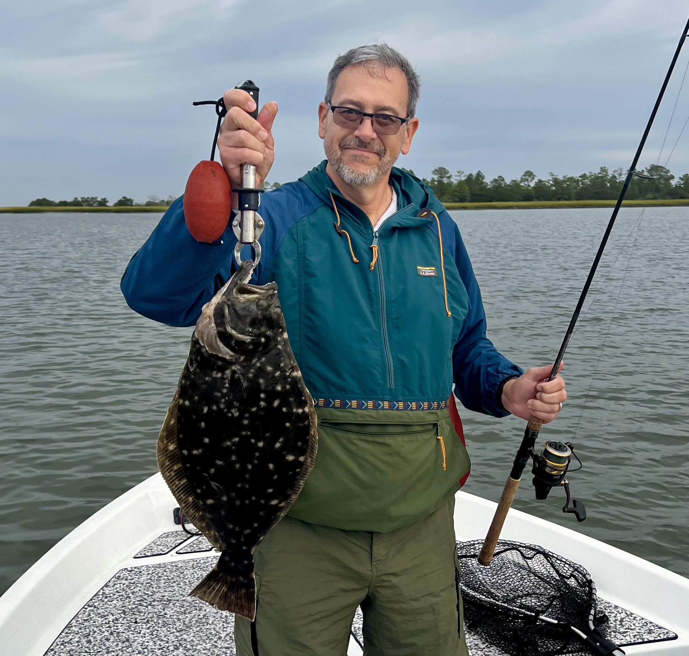 Bill Kefalas and Capt. Jack with a nice October redfish. - Coastal ...