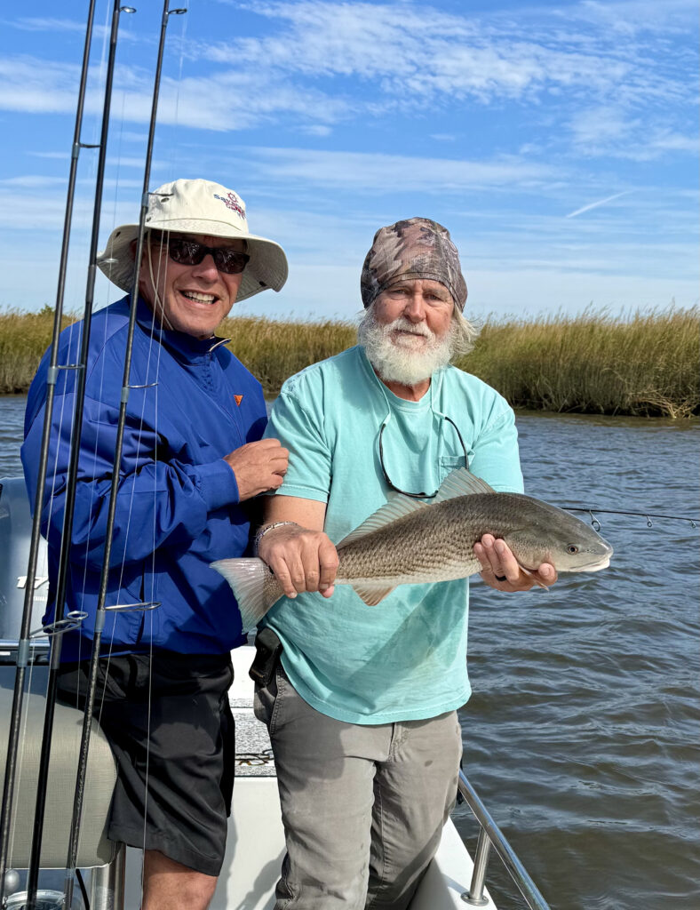 Bill Kefalas and Capt. Jack with a nice October redfish. - Coastal ...